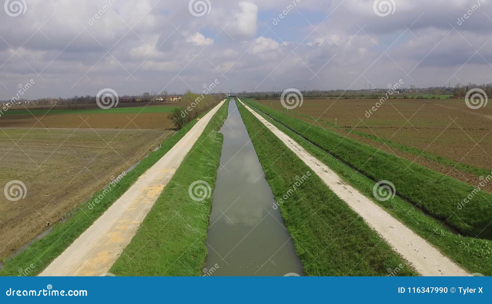 River between two fields stock photo. Image of green - 116347990