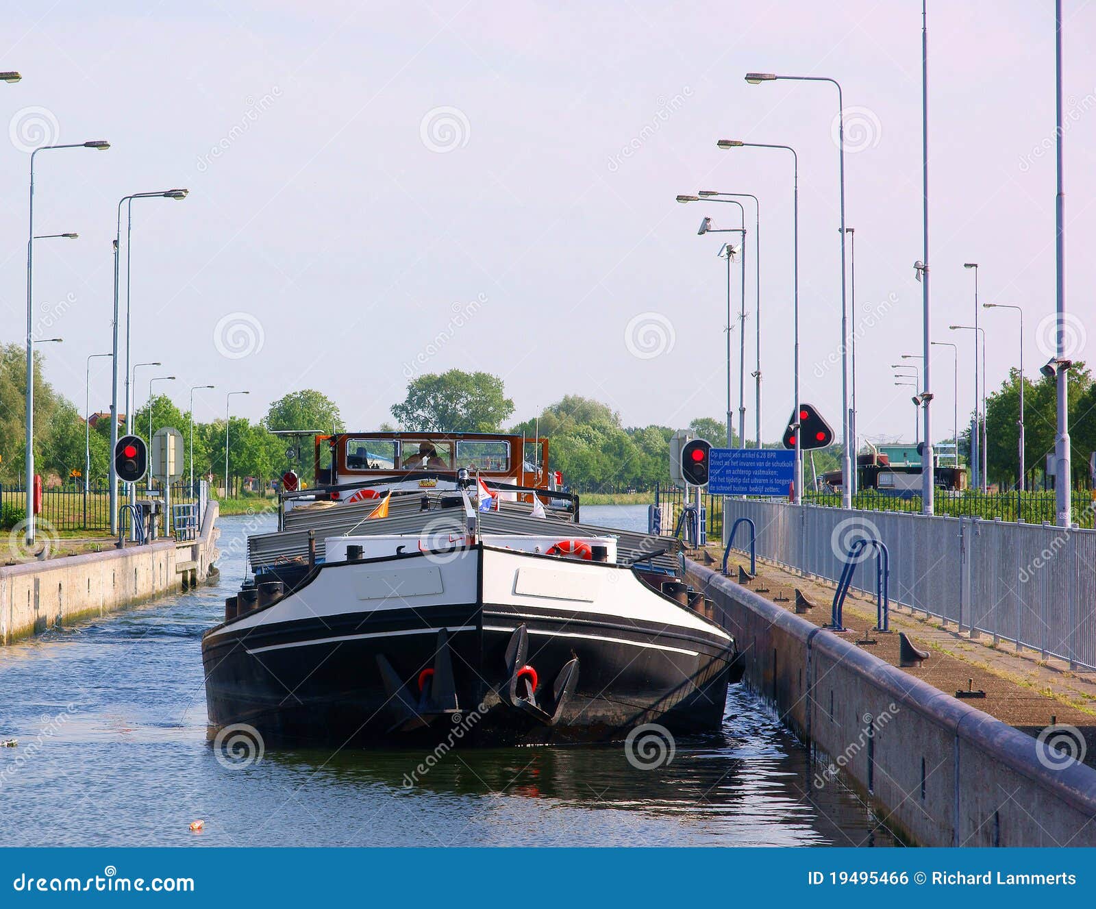 River vessel in a lock stock photo. Image of water, ship - 19495466
