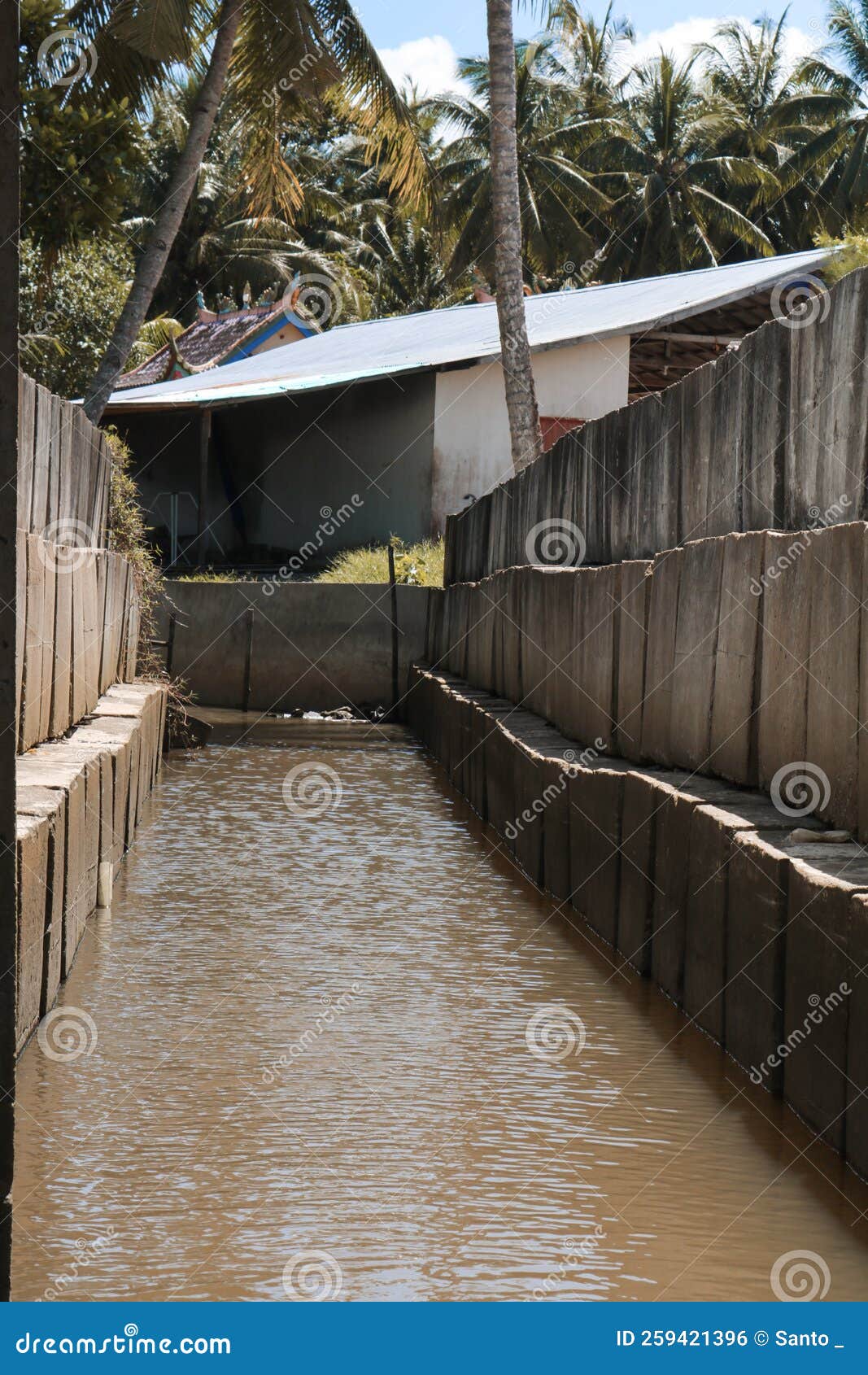 A River with a Wall on the Bank Stock Photo - Image of transport, fence ...