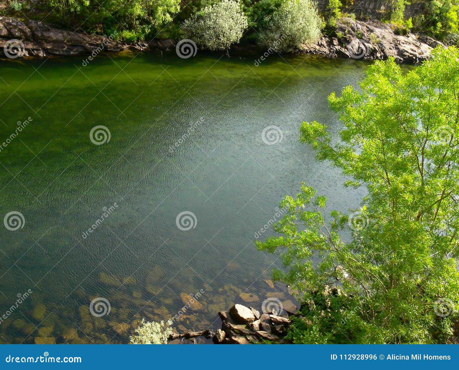 A river is a water course stock photo. Image of light - 112928996