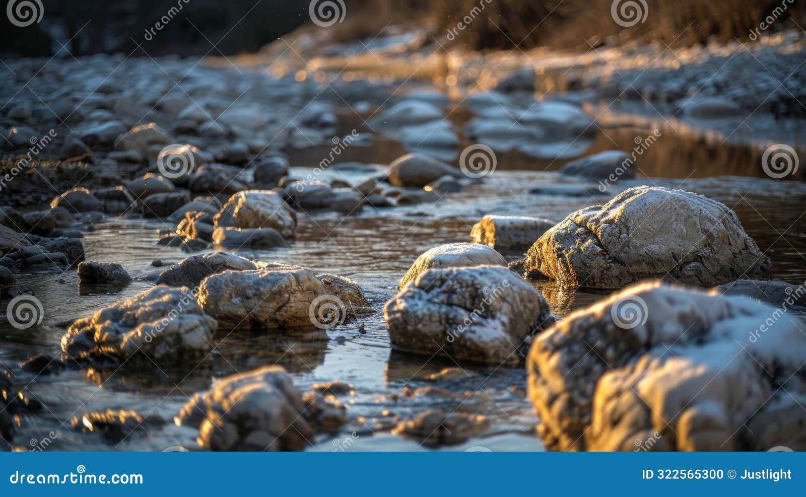 A Riverbed Lined with Unusual Rock Formations Looking Like a Host of ...
