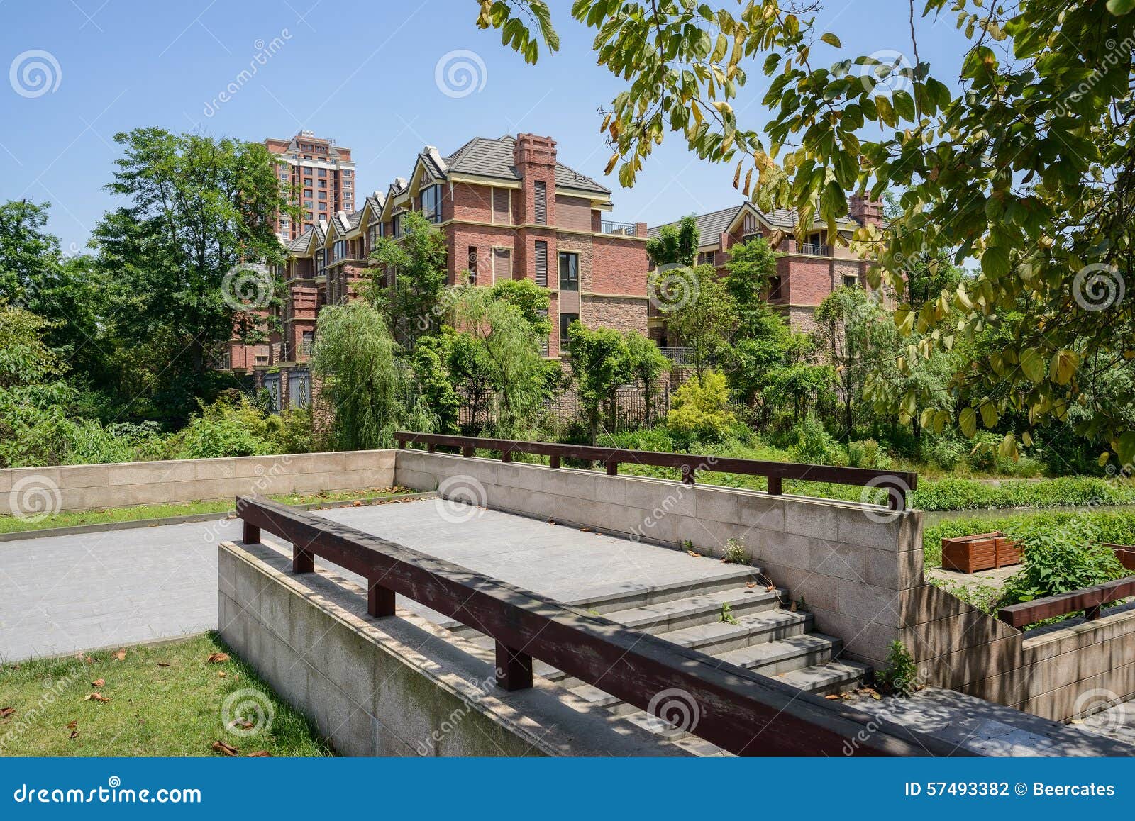 Riverside Shaded Pavement and Steps in Sunny Summer Stock Photo - Image ...
