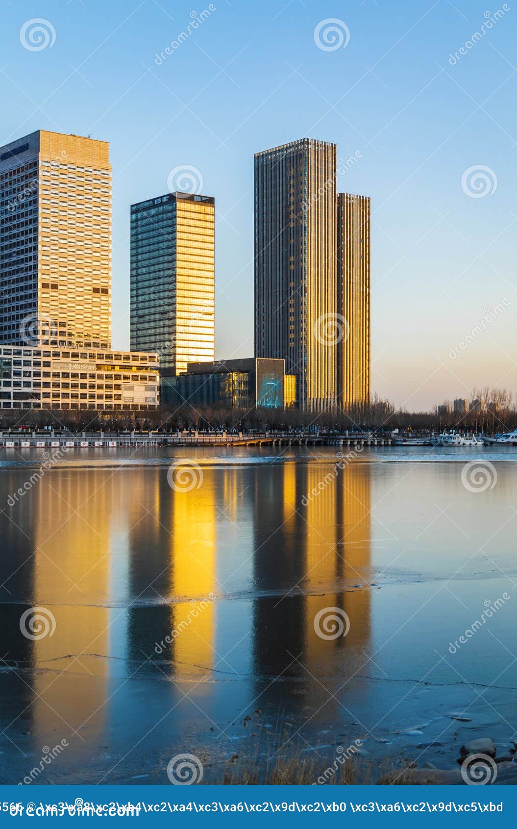Riverside Towers in the Evening Stock Photo - Image of bridge ...