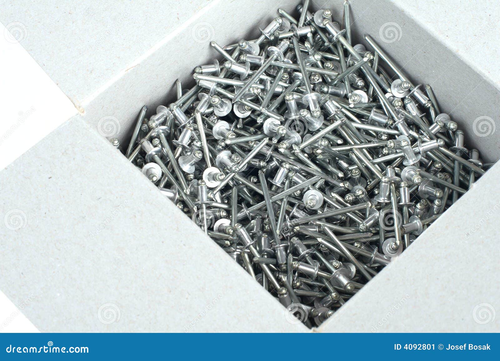 Rivets in a box stock image. Image of metal, head, fasten - 4092801
