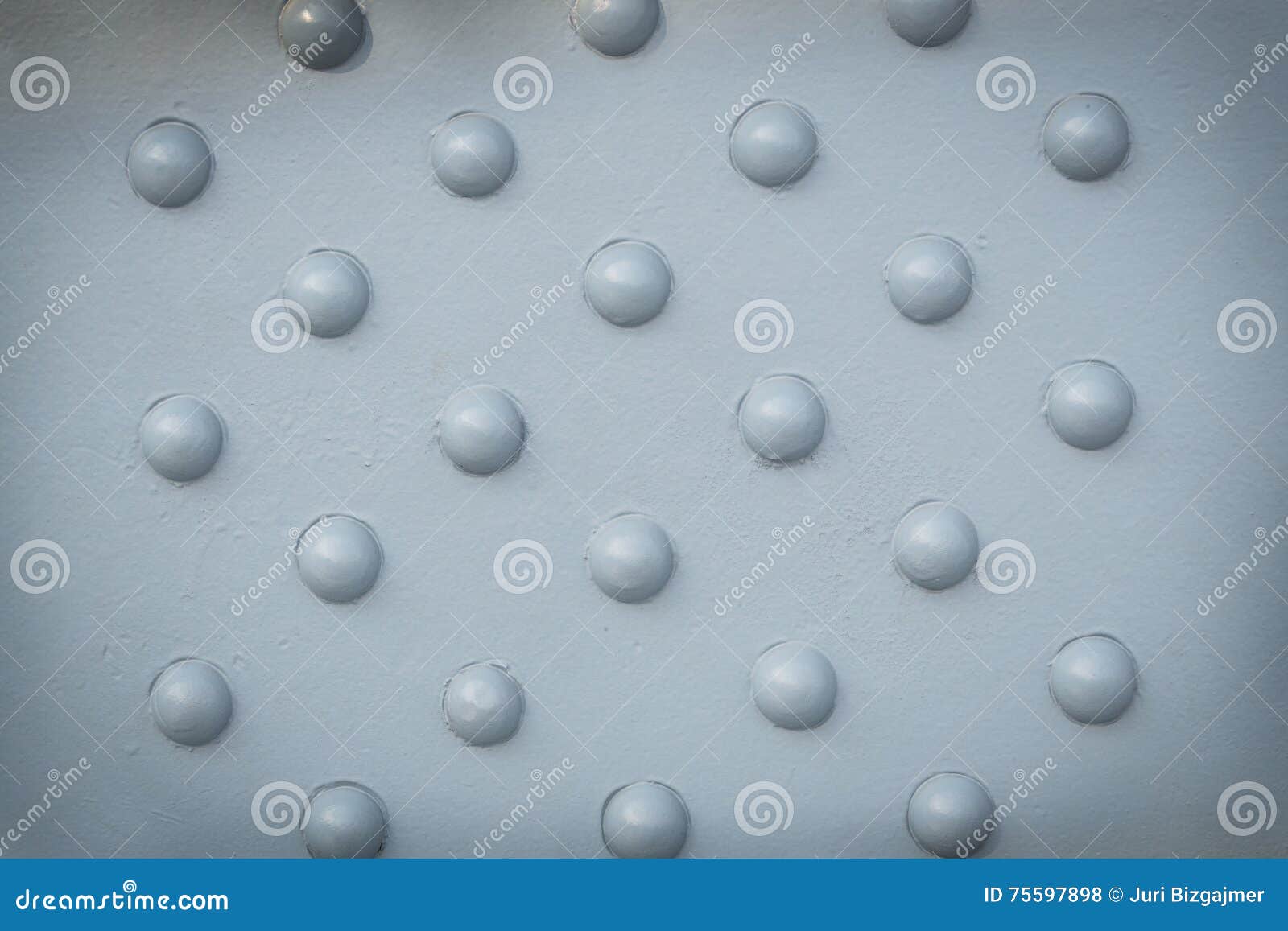 Rivets on metal surface stock photo. Image of aging, rivet - 75597898