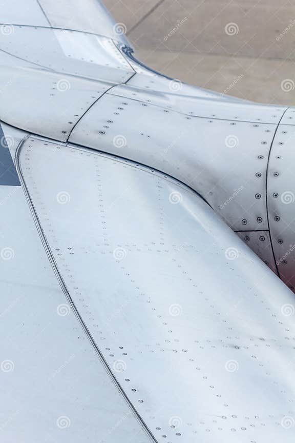 Rivets Part of an Airplane Wing and Fuselage with Rivets Stock Image ...