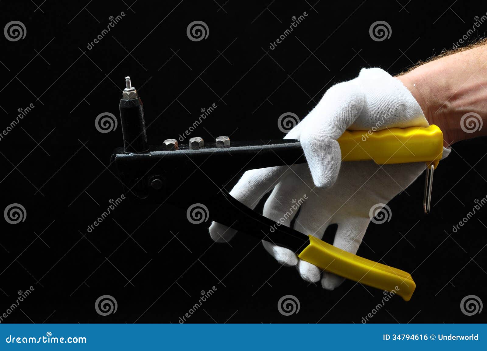 Rivets Pliers and a Hand stock photo. Image of power - 34794616