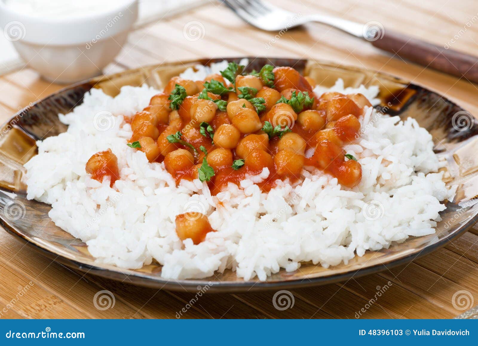 Riz Avec Des Pois Chiches En Sauce Tomate Image stock - Image du dîner ...