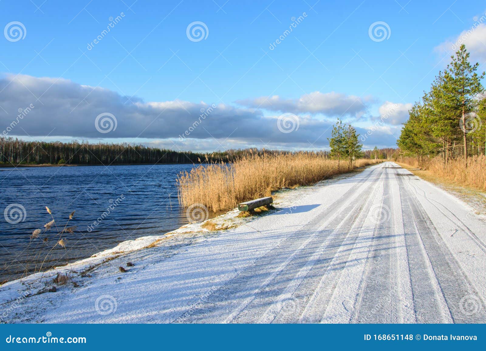 The Road Along the Lake is Covered with a Thin Layer of the First Snow ...