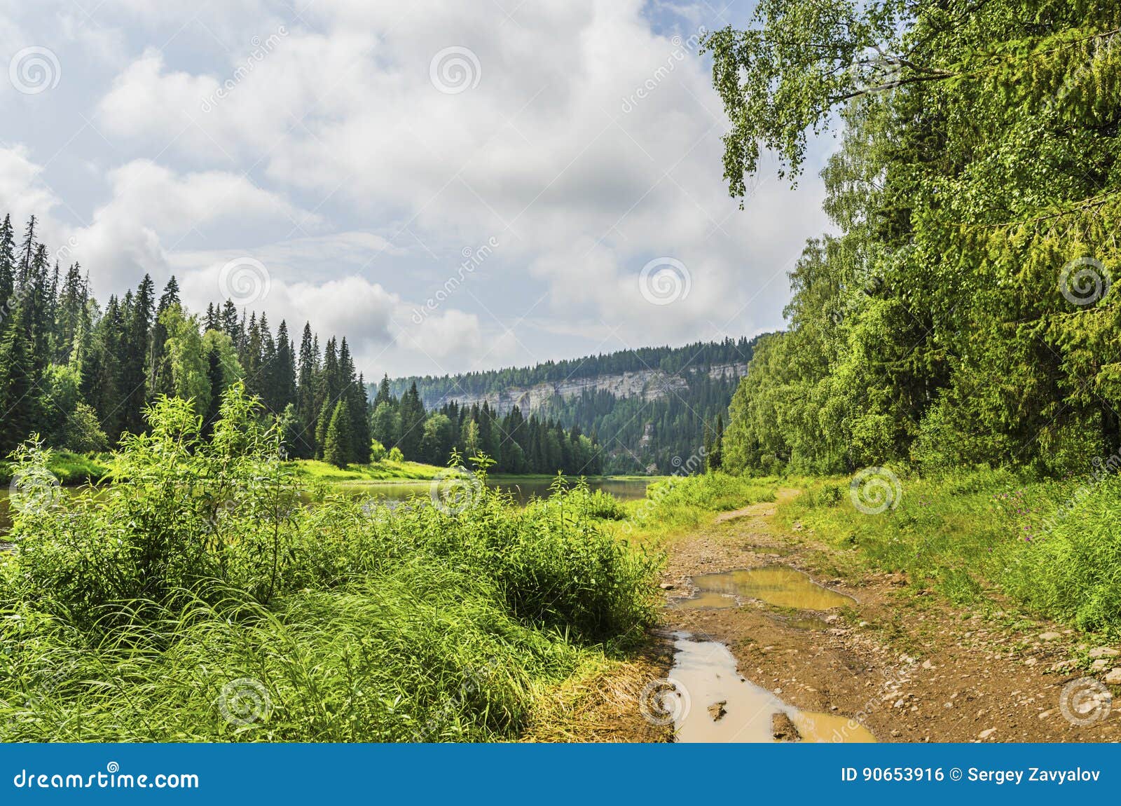 The road along the river stock photo. Image of building - 90653916