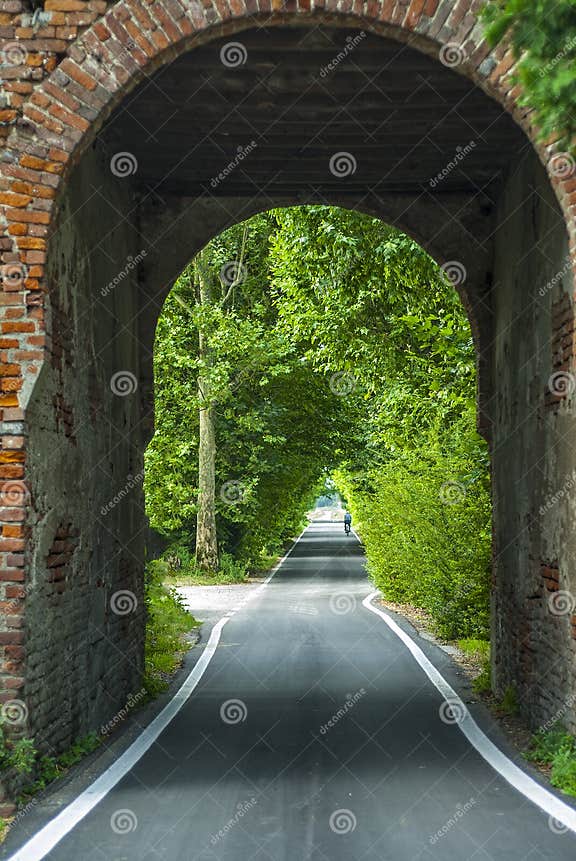 Road through arch in Italy stock photo. Image of summer - 28520704