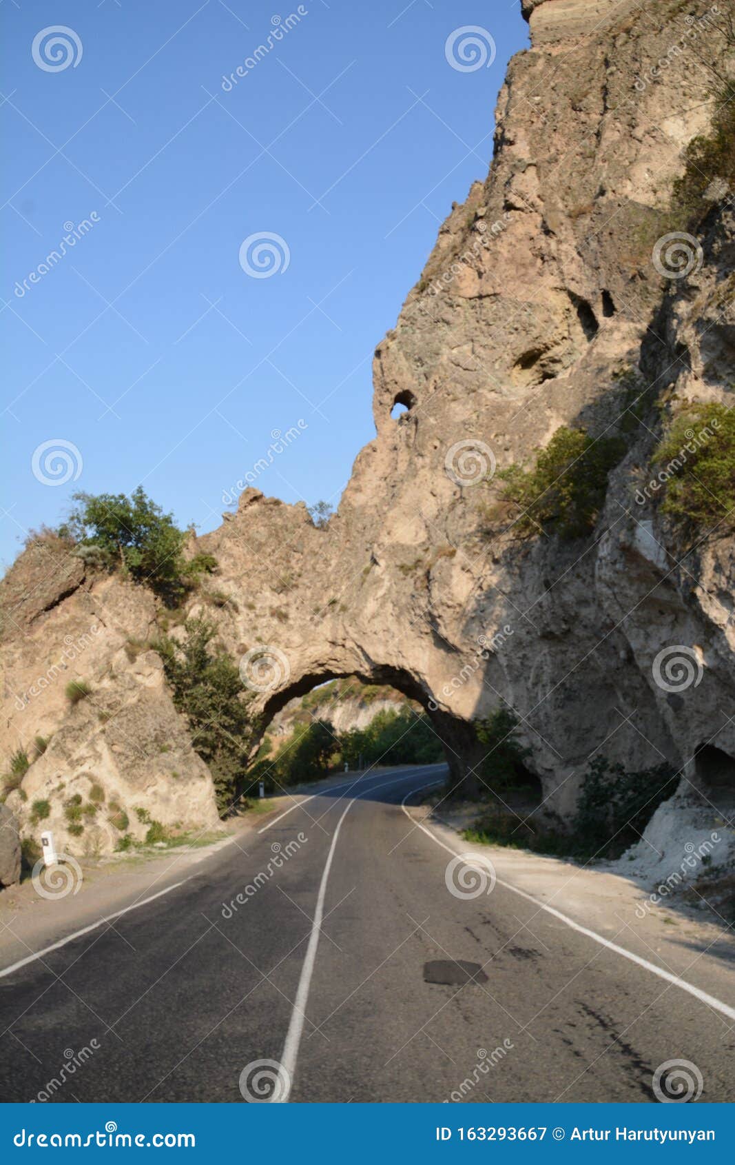 Road with a beautiful cave editorial photography. Image of wild - 163293667