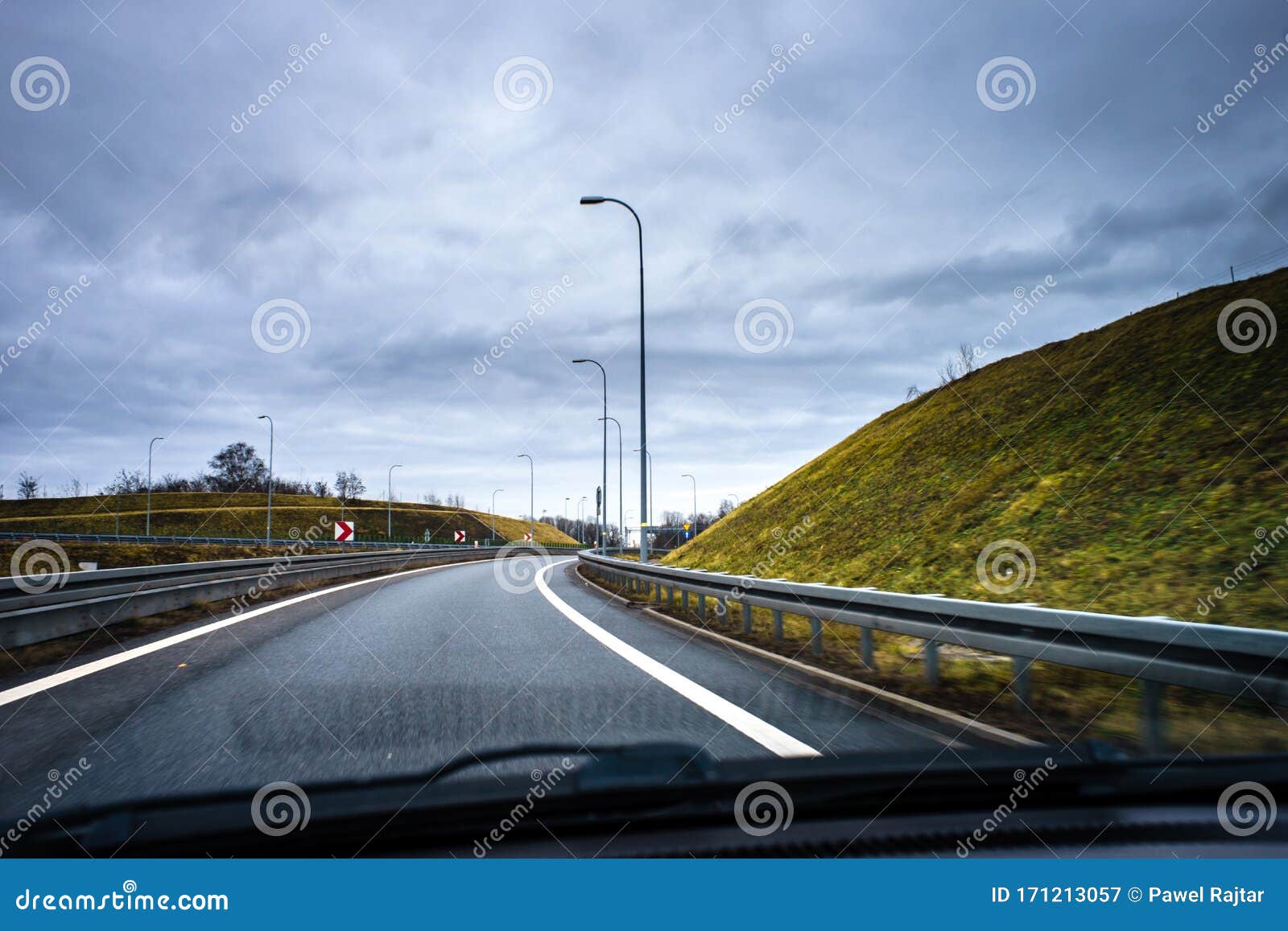 A Road Bend Seen from a Moving Car through the Windshield. Stock Image ...