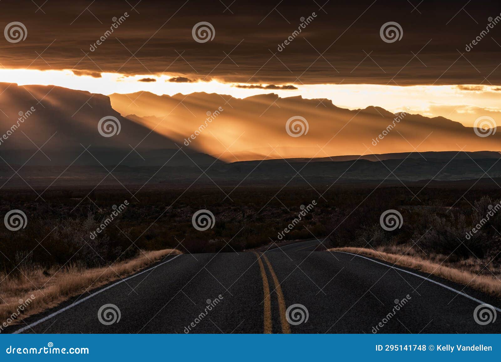 Road Bends Over Hill Below Dramatic Sun Rise Rays Stock Photo - Image ...
