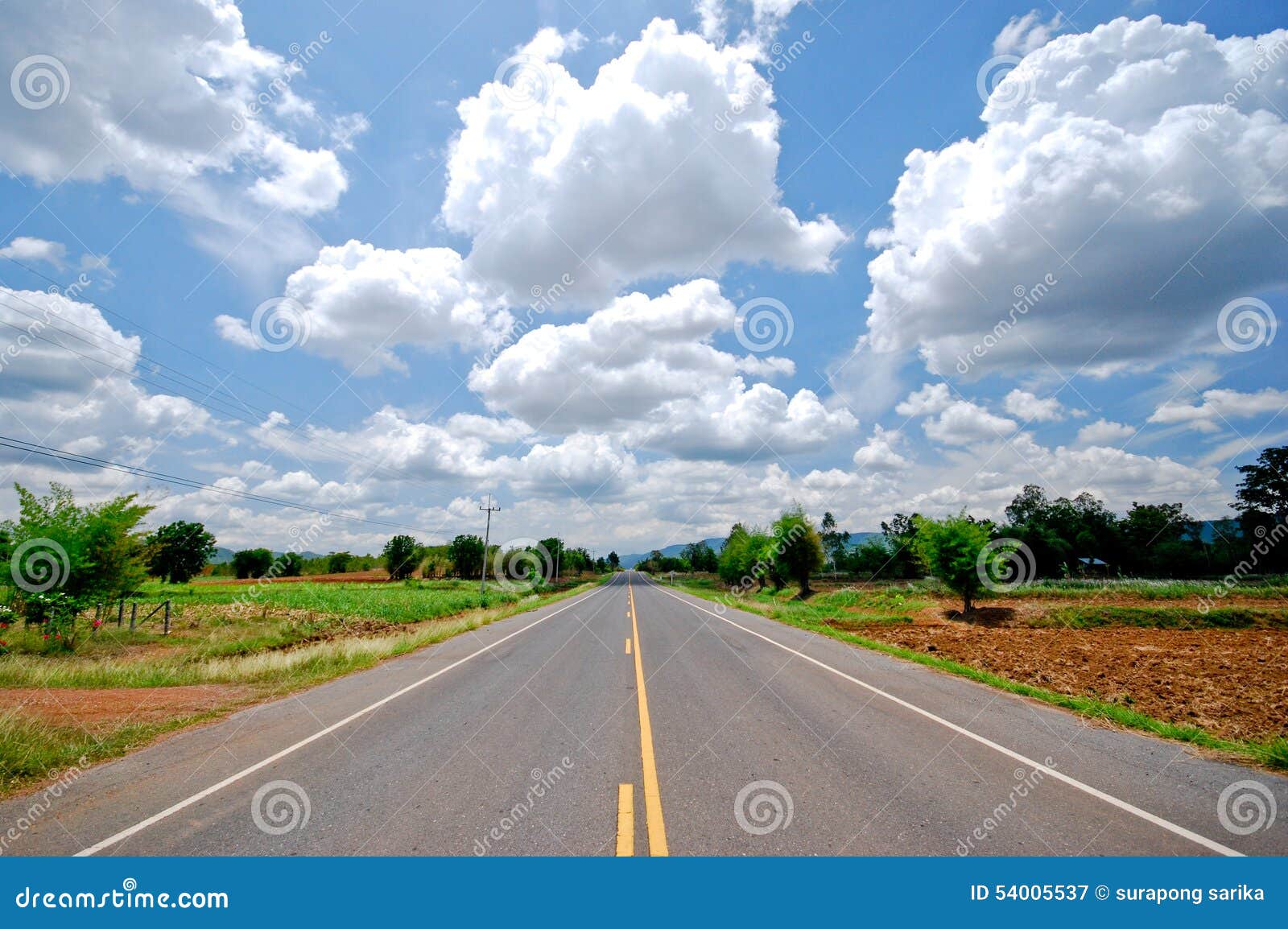 Road and big clouds stock image. Image of blue, clouds - 54005537