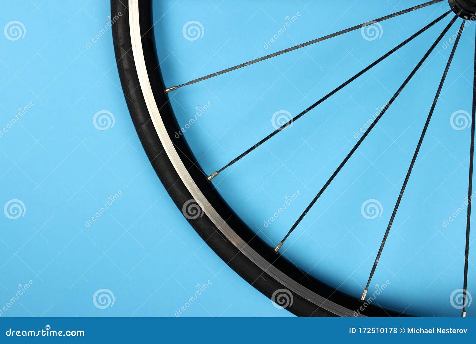 Road Bike Wheel on a Blue Background Stock Photo - Image of profile ...