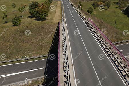 Road bridge over highway stock photo. Image of outdoors - 21659324