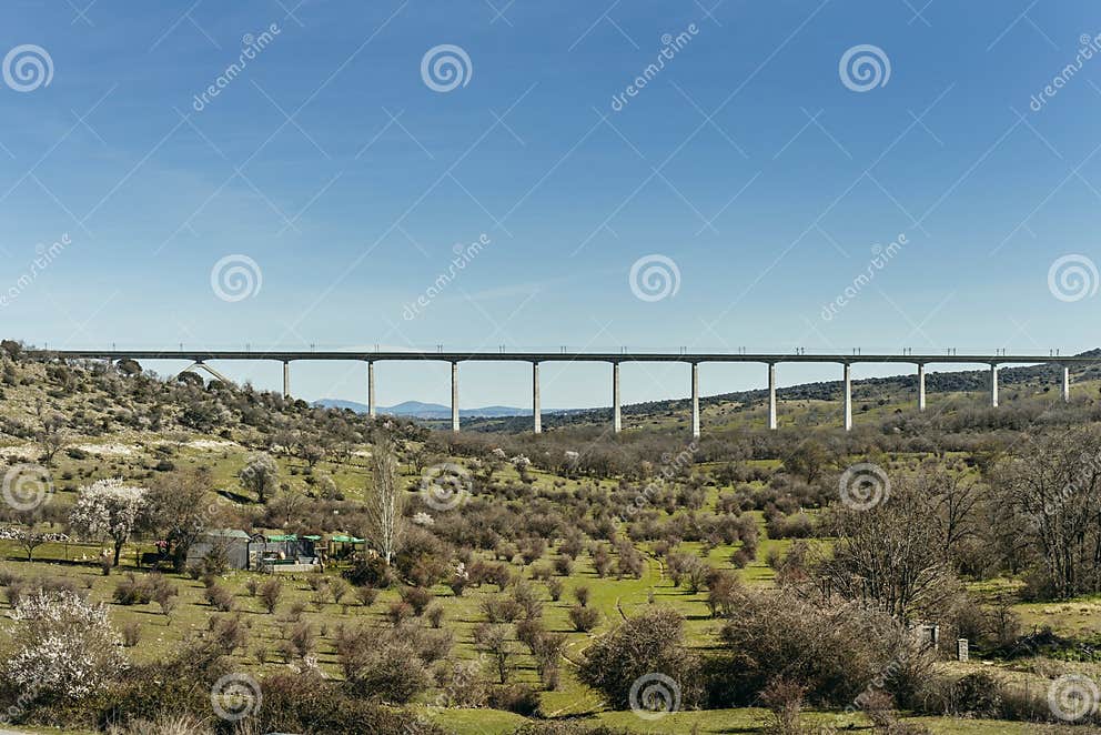 A Road Bridge Over a Valley with Sparse Vegetation Stock Photo - Image ...
