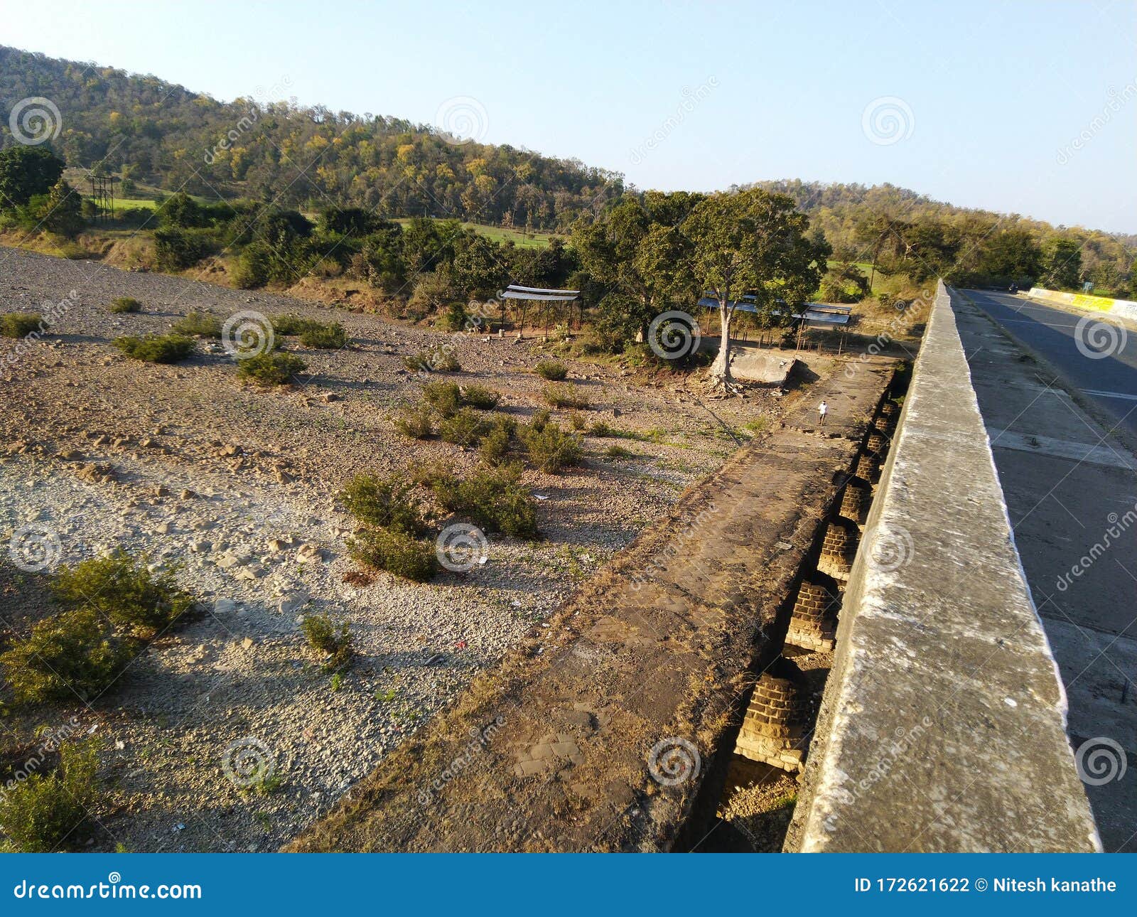 Road with a Bridge on River without Water and Green Tree Stock Photo ...