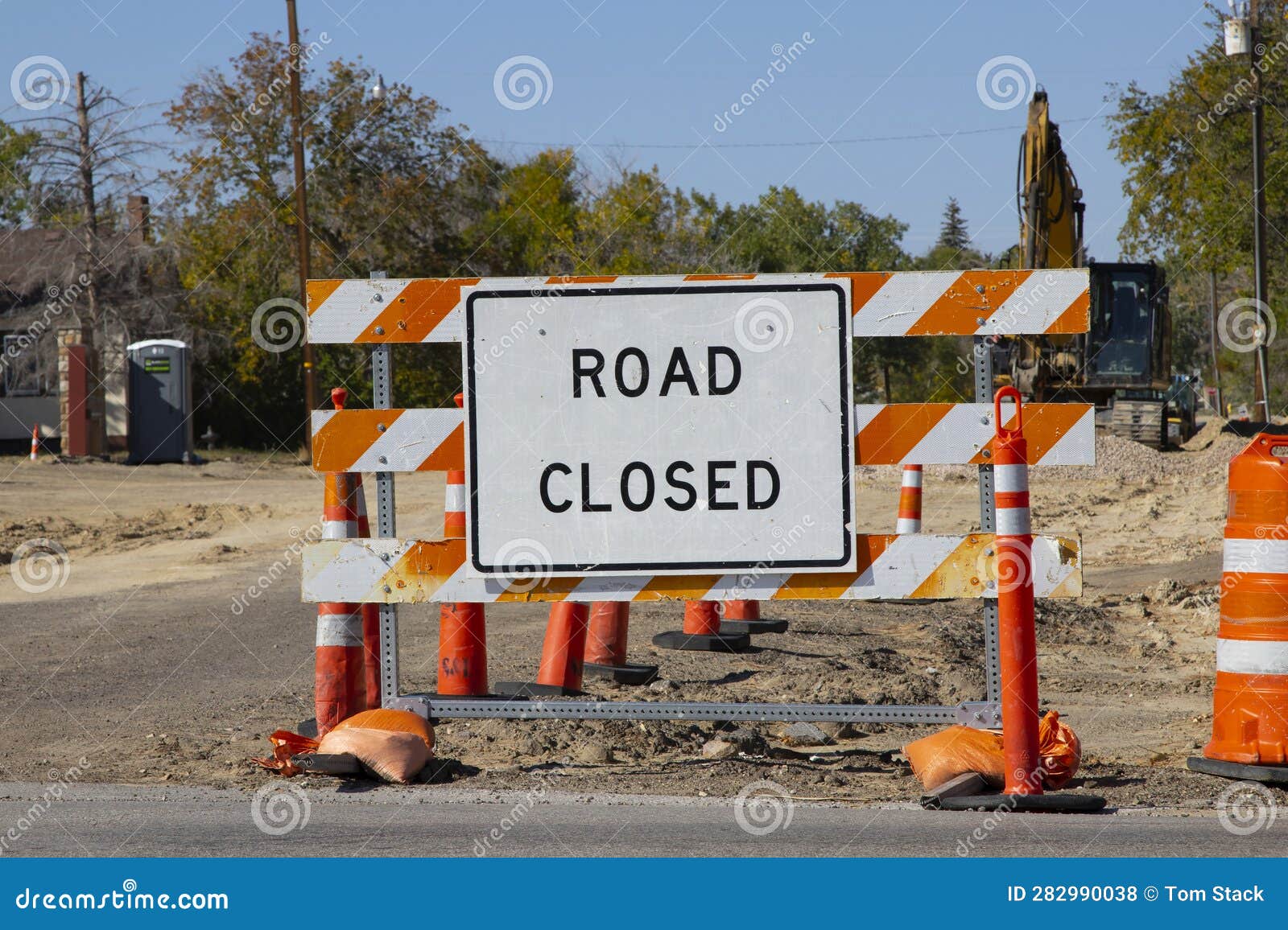 A Road closed warning sign stock photo. Image of construction - 282990038