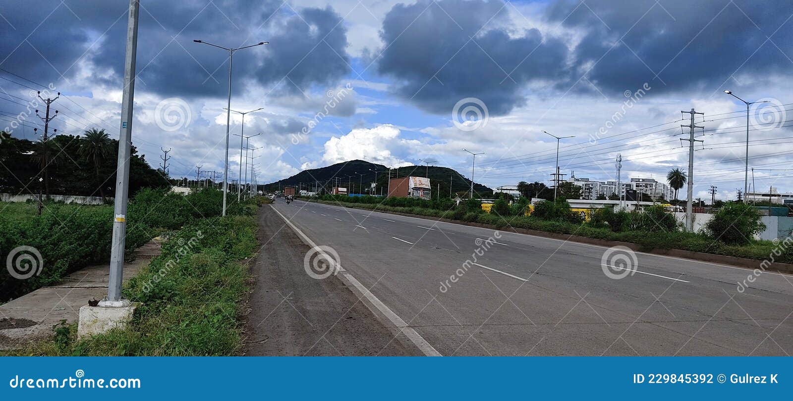 Road with Clouds and Blue Sky Stock Photo - Image of field, cloud ...