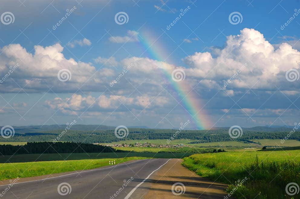 Road, clouds and rainbow stock photo. Image of foliage - 1715038