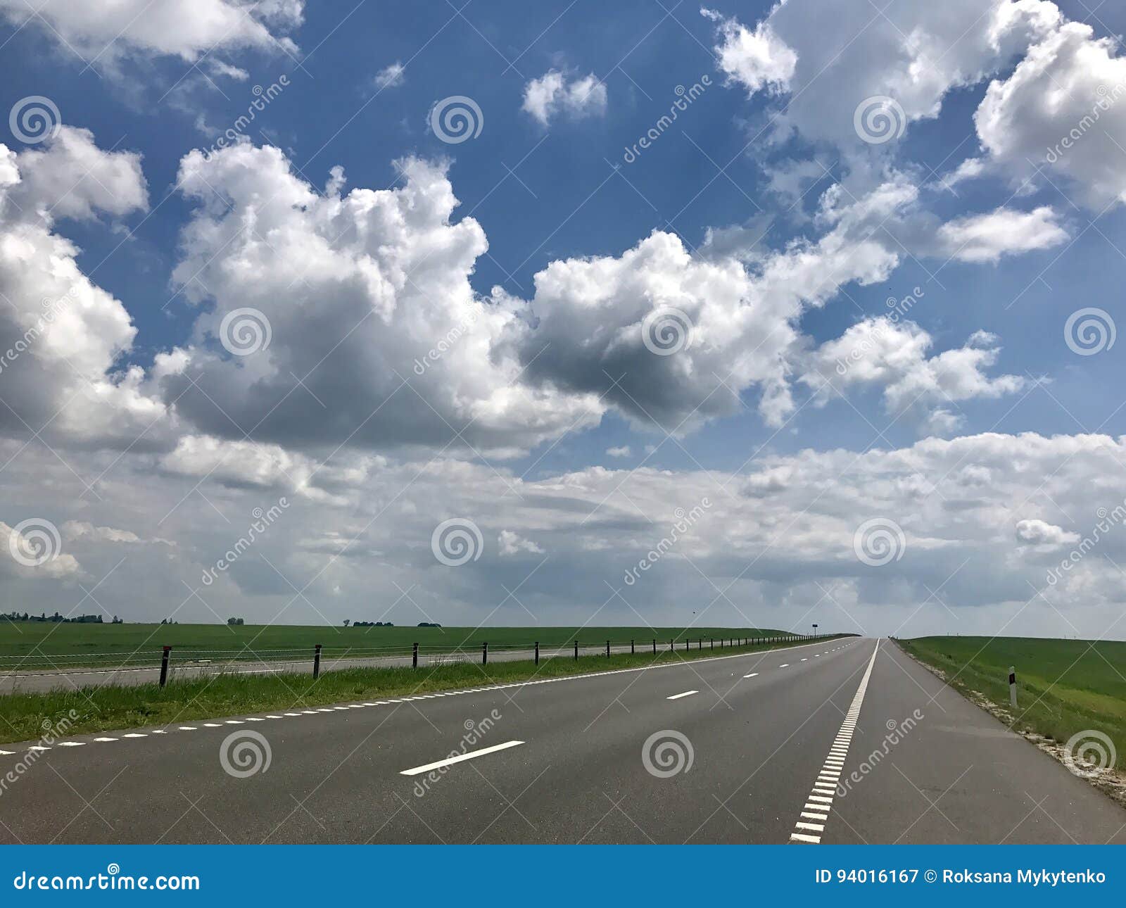 Road with clouds stock image. Image of sunset, beautiful - 94016167