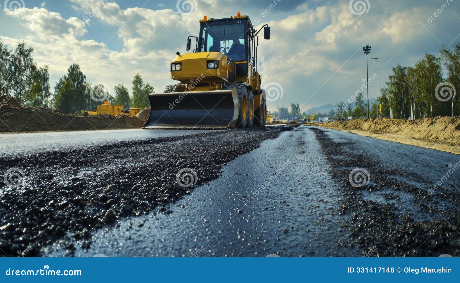 Road Construction Equipment is Working on a Section of Road, Creating ...