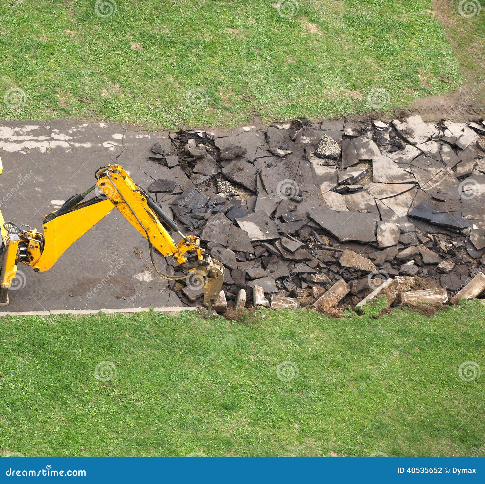 Road Construction Machine Breaks Up Old Asphalt Road Stock Photo ...