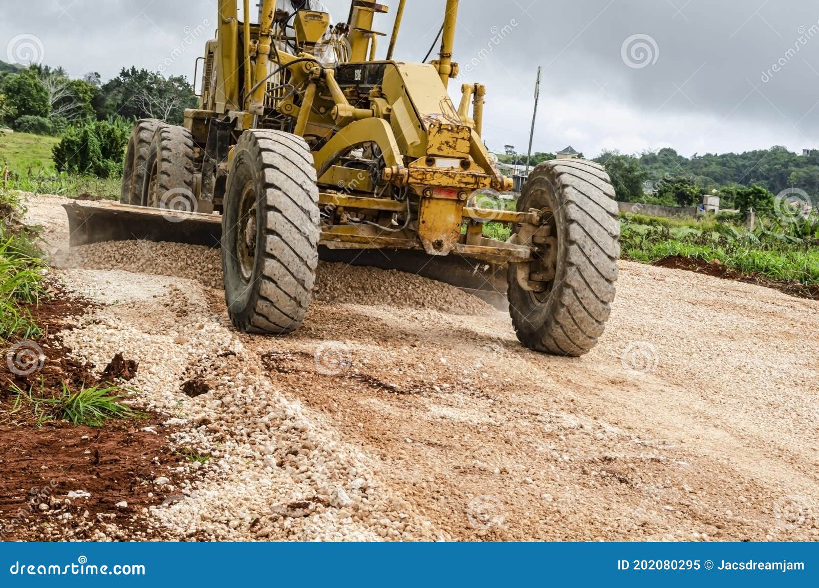 Motor Grader Leveling Marl on Roadway Stock Image - Image of clouds ...