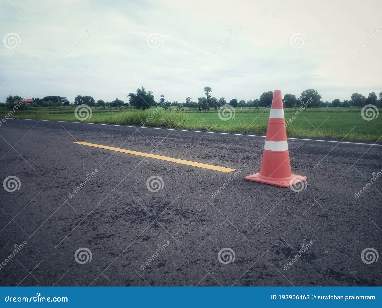 Road Construction with a Red Rubber Cone in Front Stock Image - Image ...