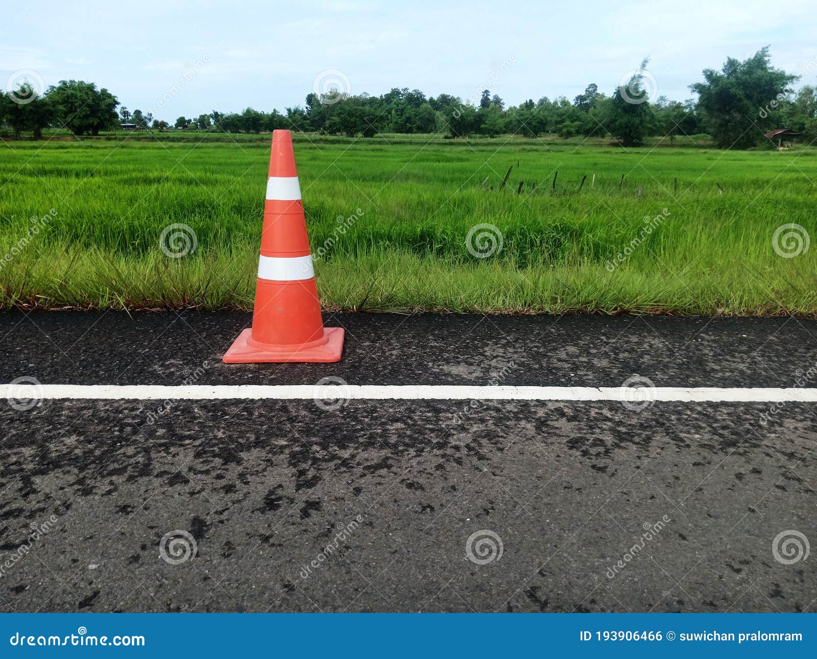 Road Construction with a Red Rubber Cone in Front Stock Photo - Image ...