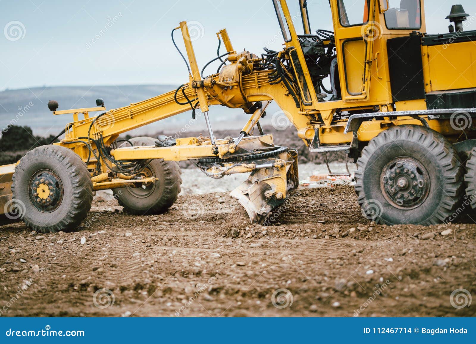 Highway Construction Site Development with Motor Grader Moving Earth ...