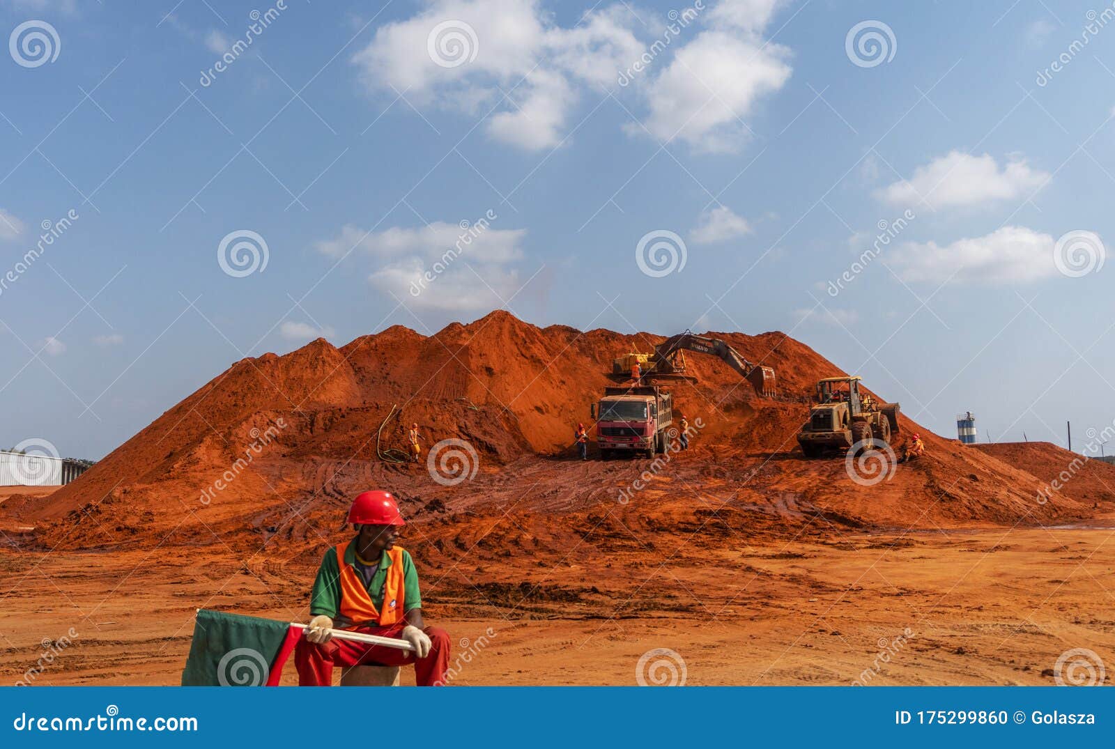 Road Construction Site with Worker Controlling Traffic, Mozambique ...