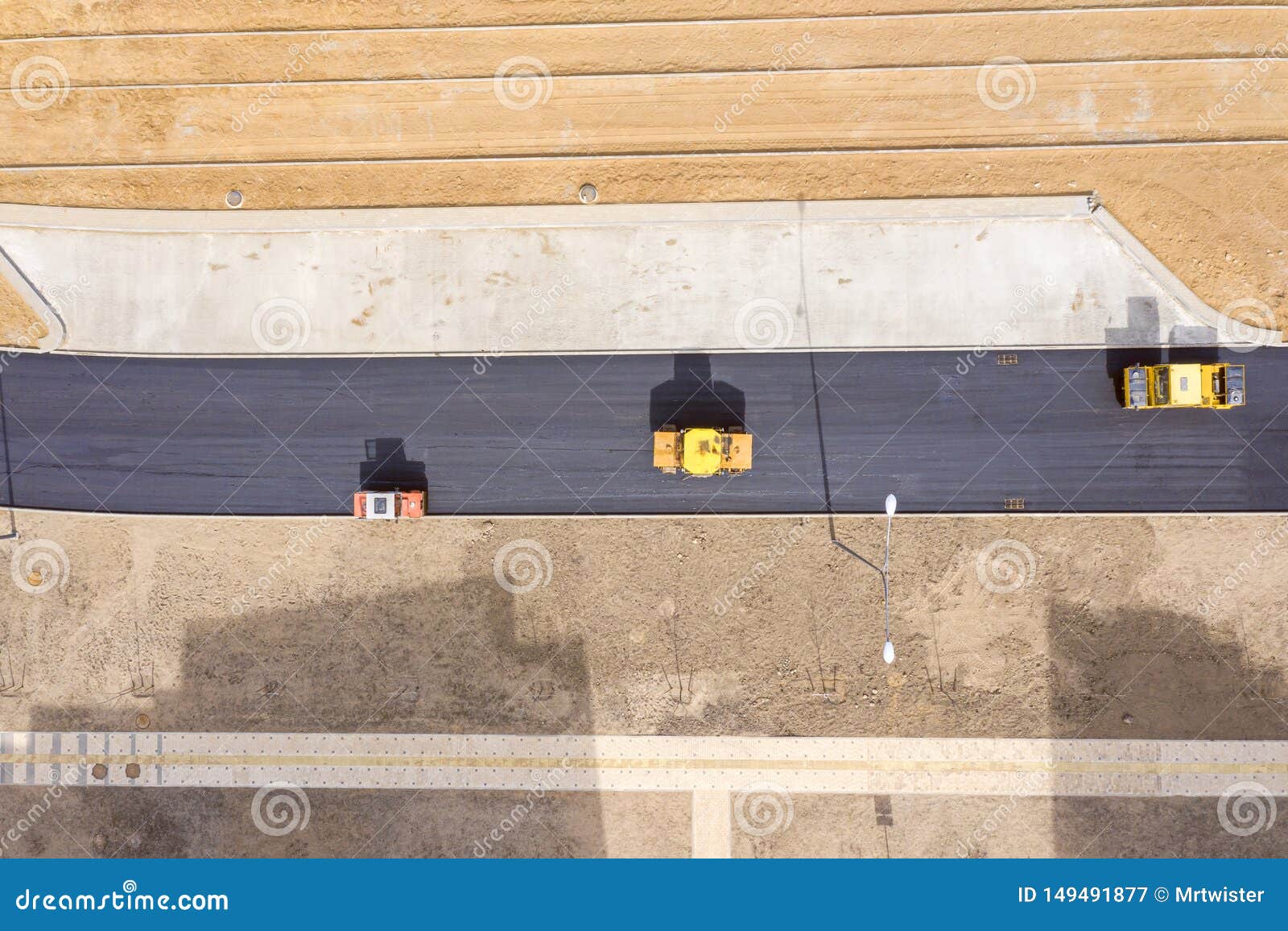 Road Construction Top View. Group of Yellow Road Rollers Laying Asphalt ...