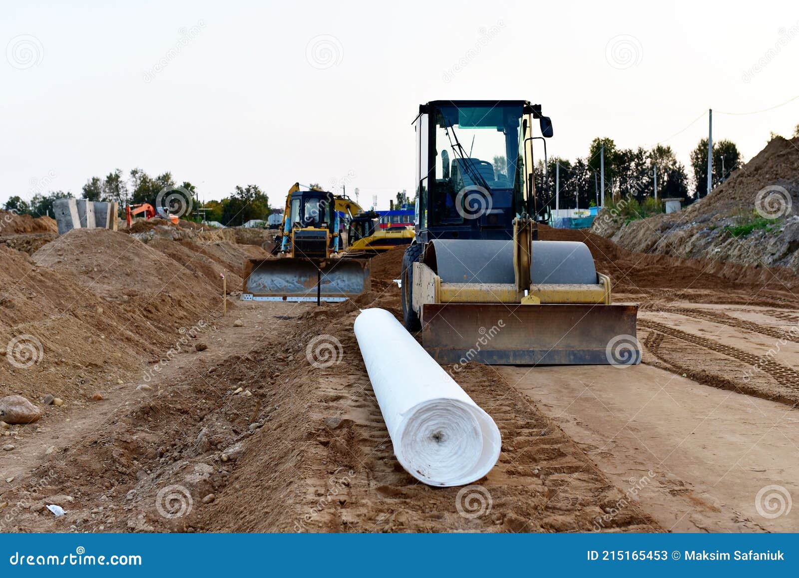 Leveling And Compaction Of Soil On The Construction Site. Modern Mini ...