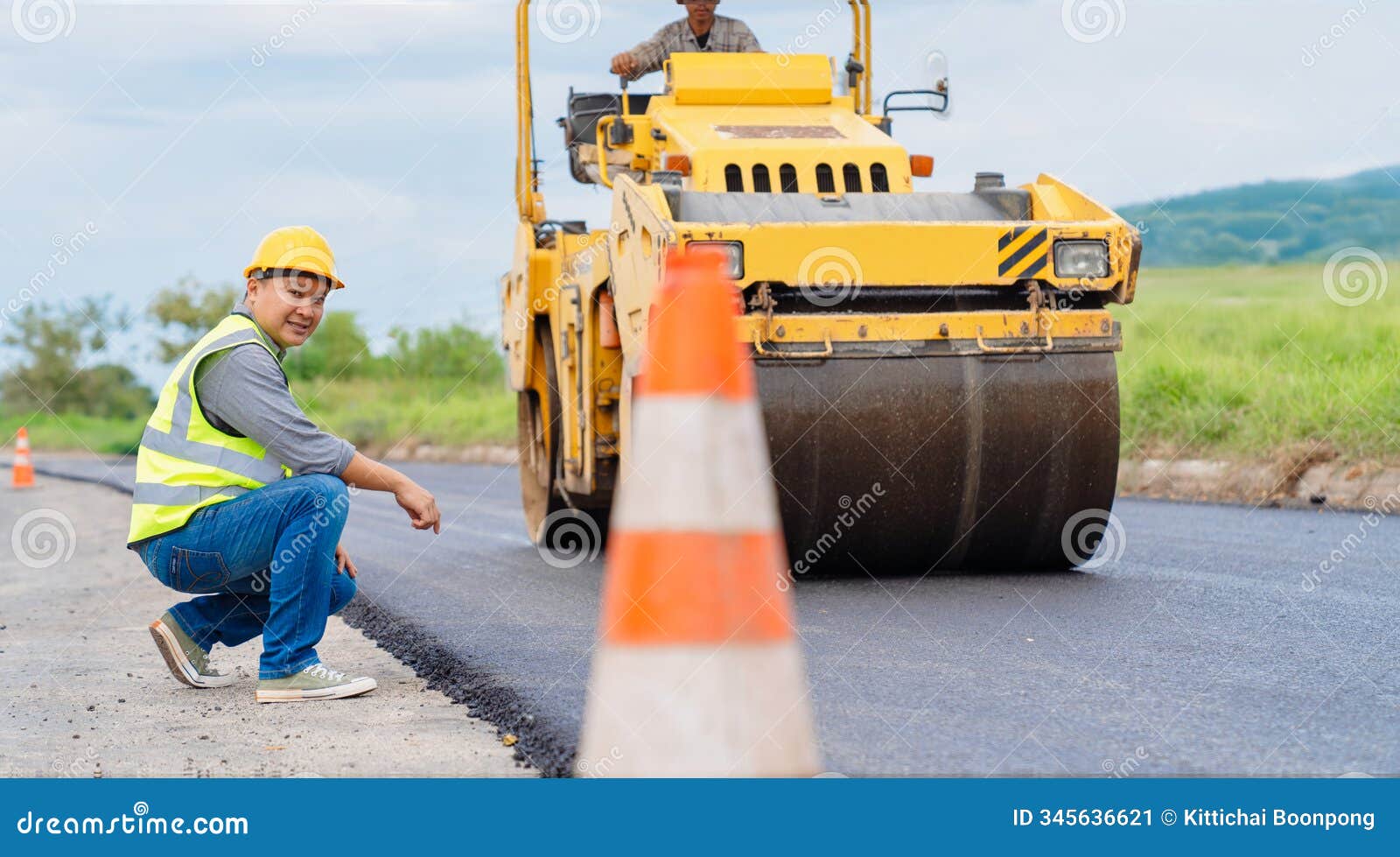 Road Construction Worker with Roller Machine and Traffic Cone Stock ...