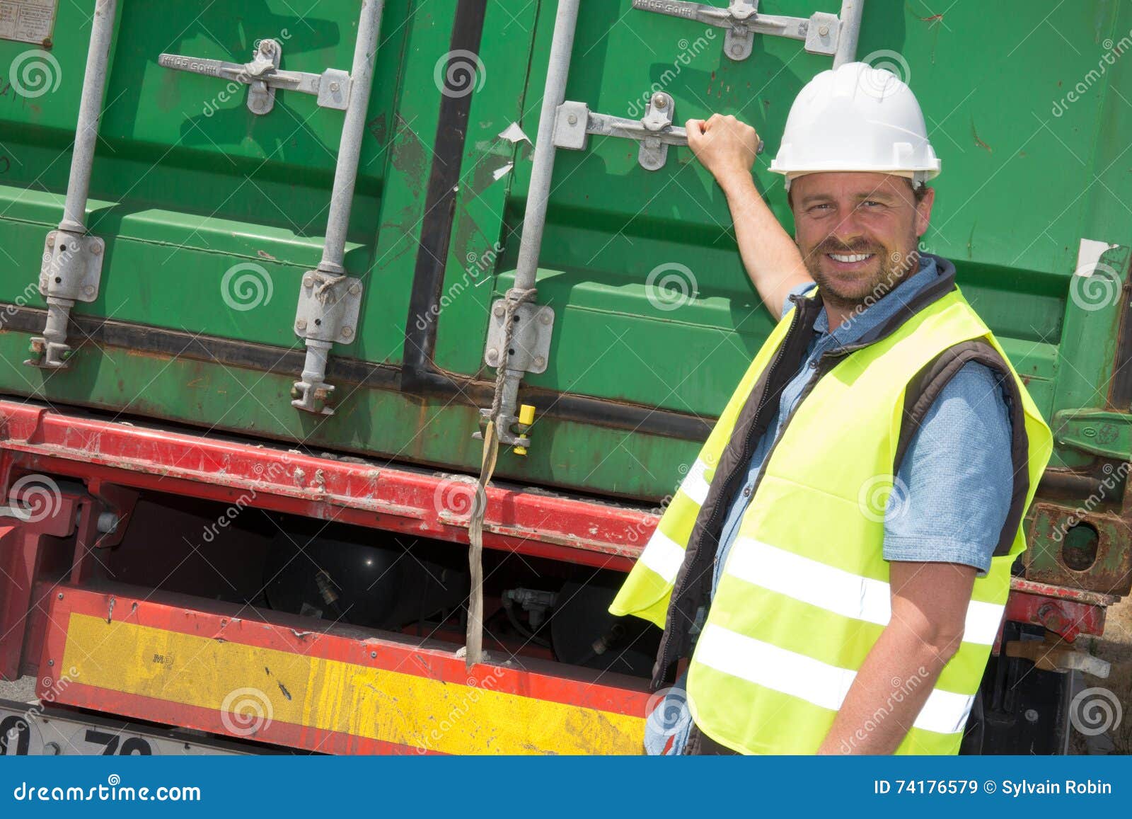 Road Construction Worker Standing beside the Truck on Location Site ...