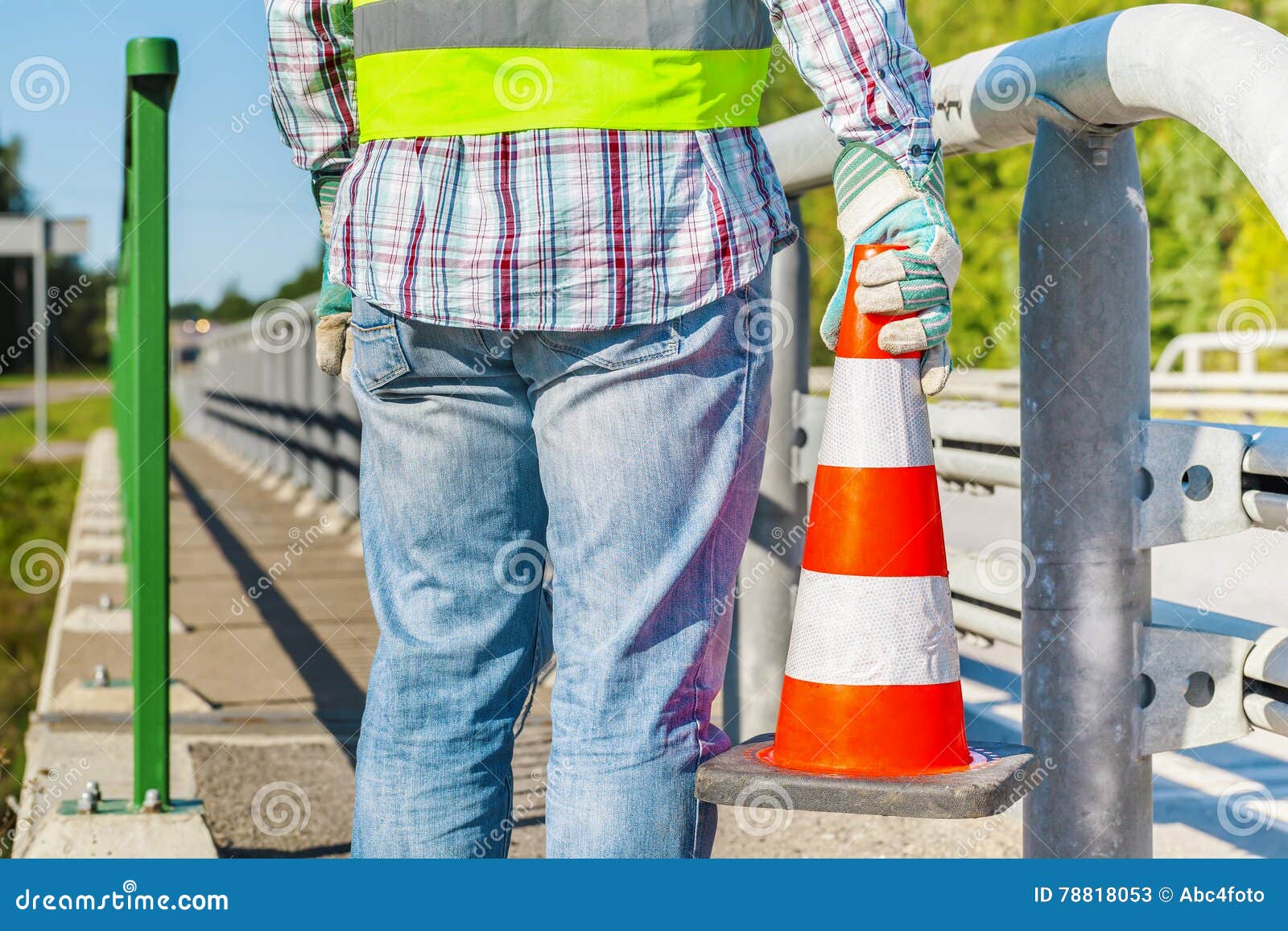 Road Construction Worker with Traffic Cone Near Highway Stock Image ...