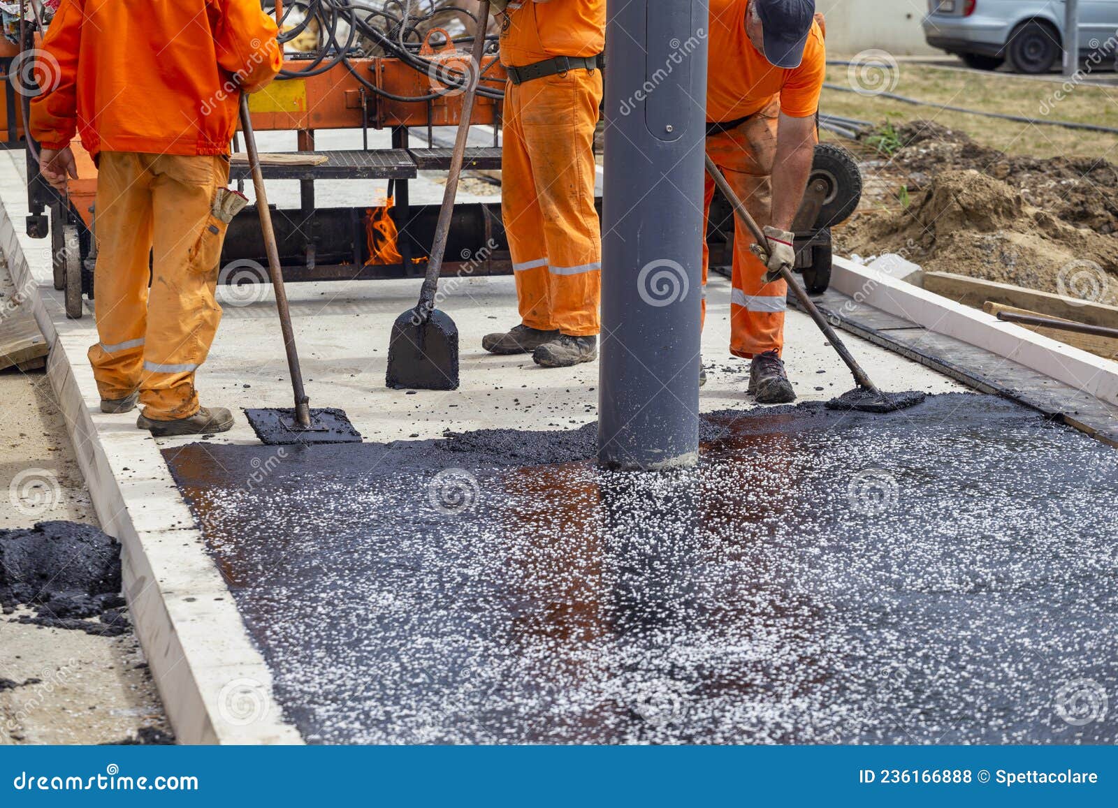 Road Construction Workers Leveling Hot Asphalt Stock Photo - Image of ...