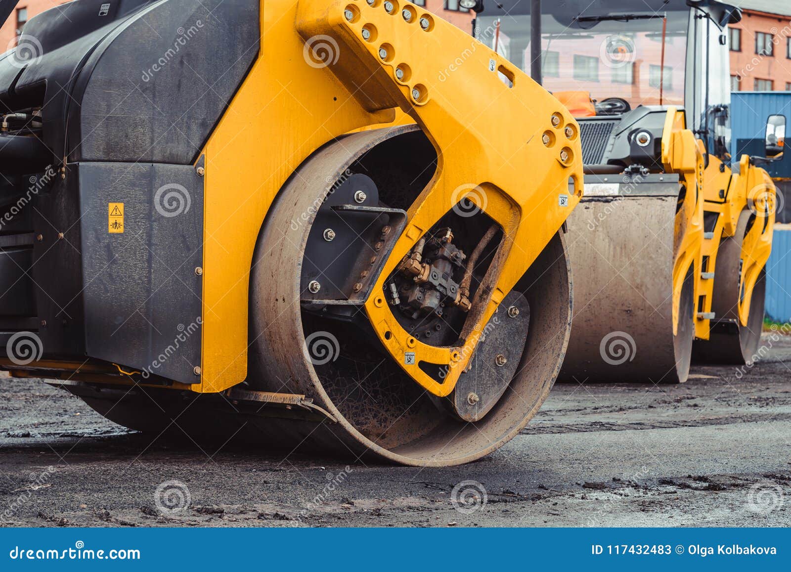 Asphalt laying machines stock image. Image of concrete - 117432483
