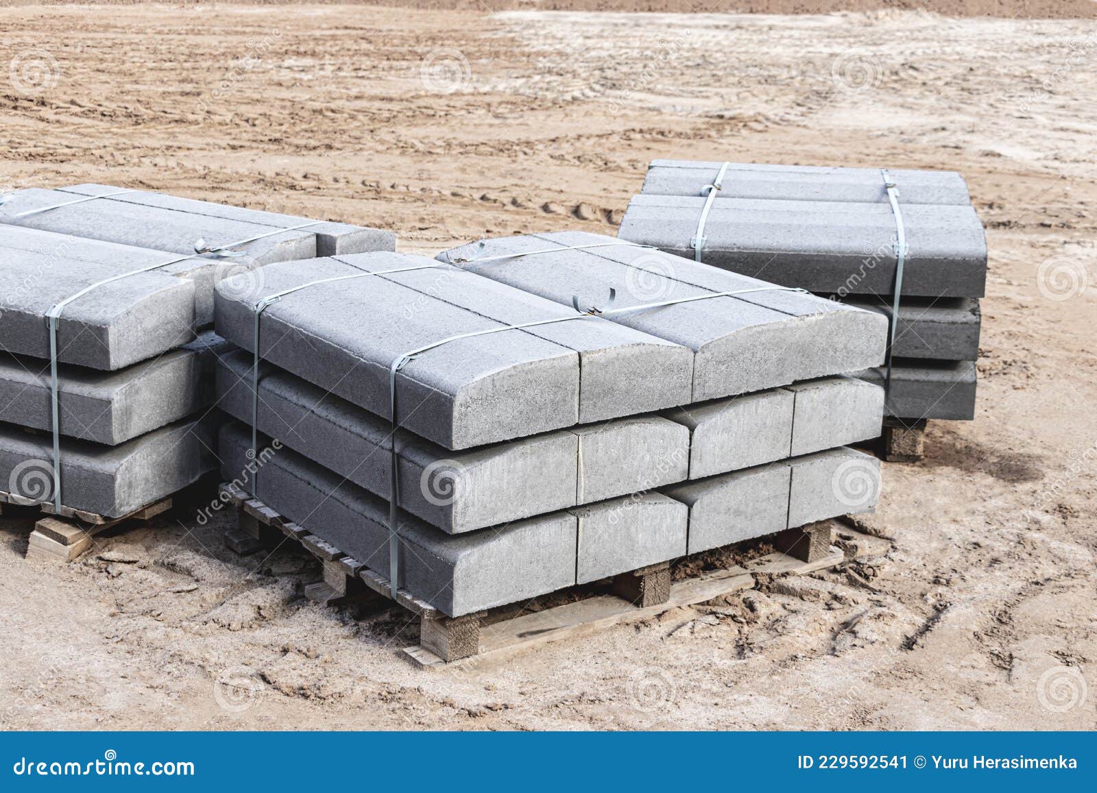 Road Curbs in a Pack. Curbstone Prepared for Laying on the Construction ...
