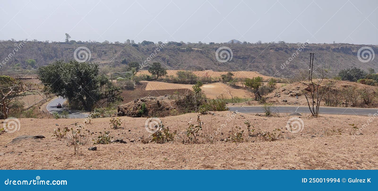 Road with a Curve on Hill Side Stock Photo - Image of colour, asphalt ...