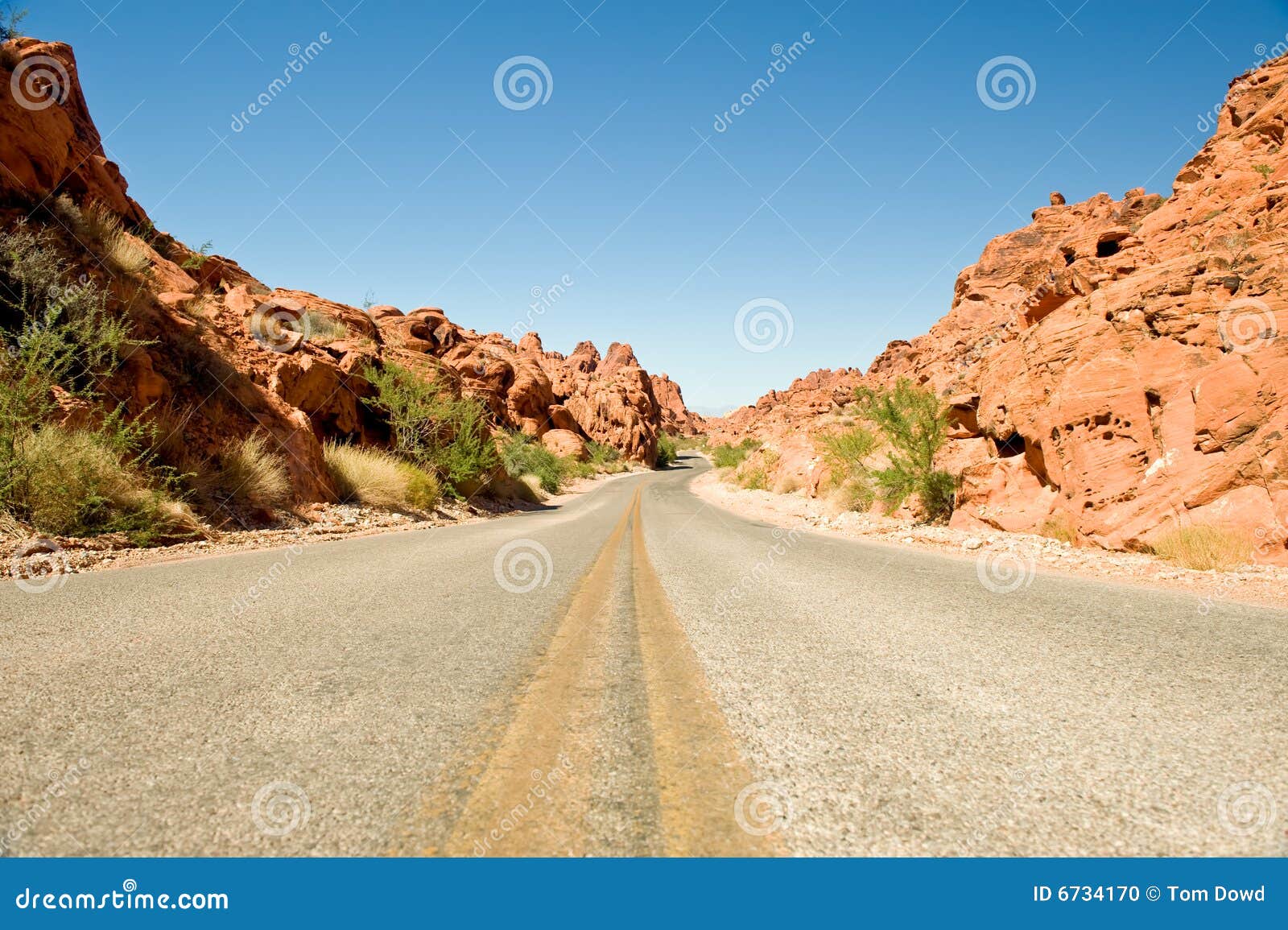 Road through desert rocks stock photo. Image of reddish - 6734170