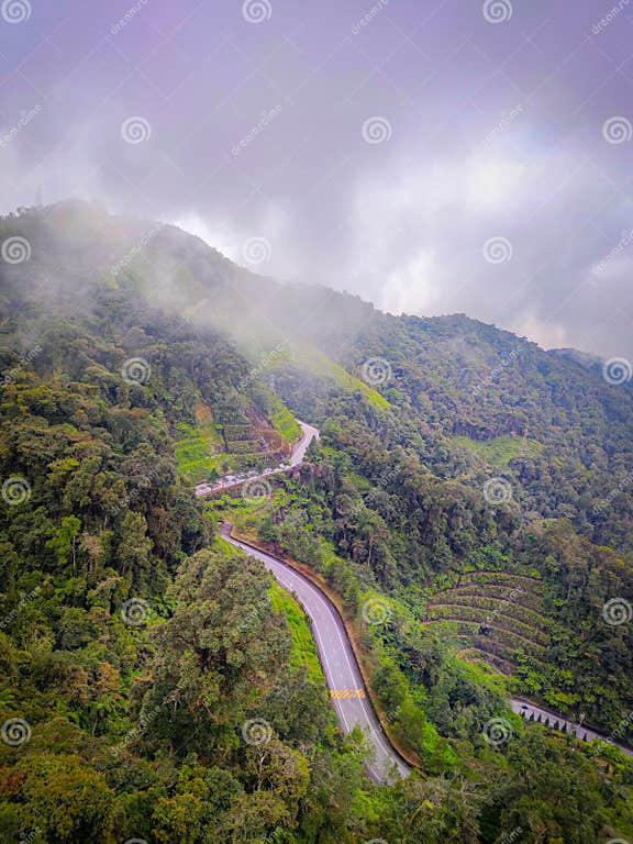 The Road at the Foot of the Hill. Scenery at Hill Stock Photo - Image ...