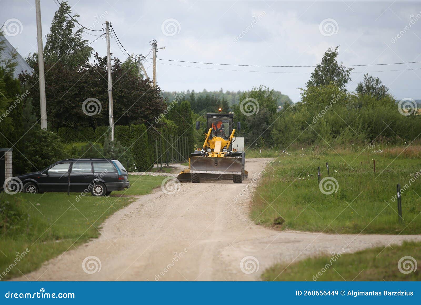 Road Grader Bulldozer, Leveling the Settlements on the Road Stock Image ...