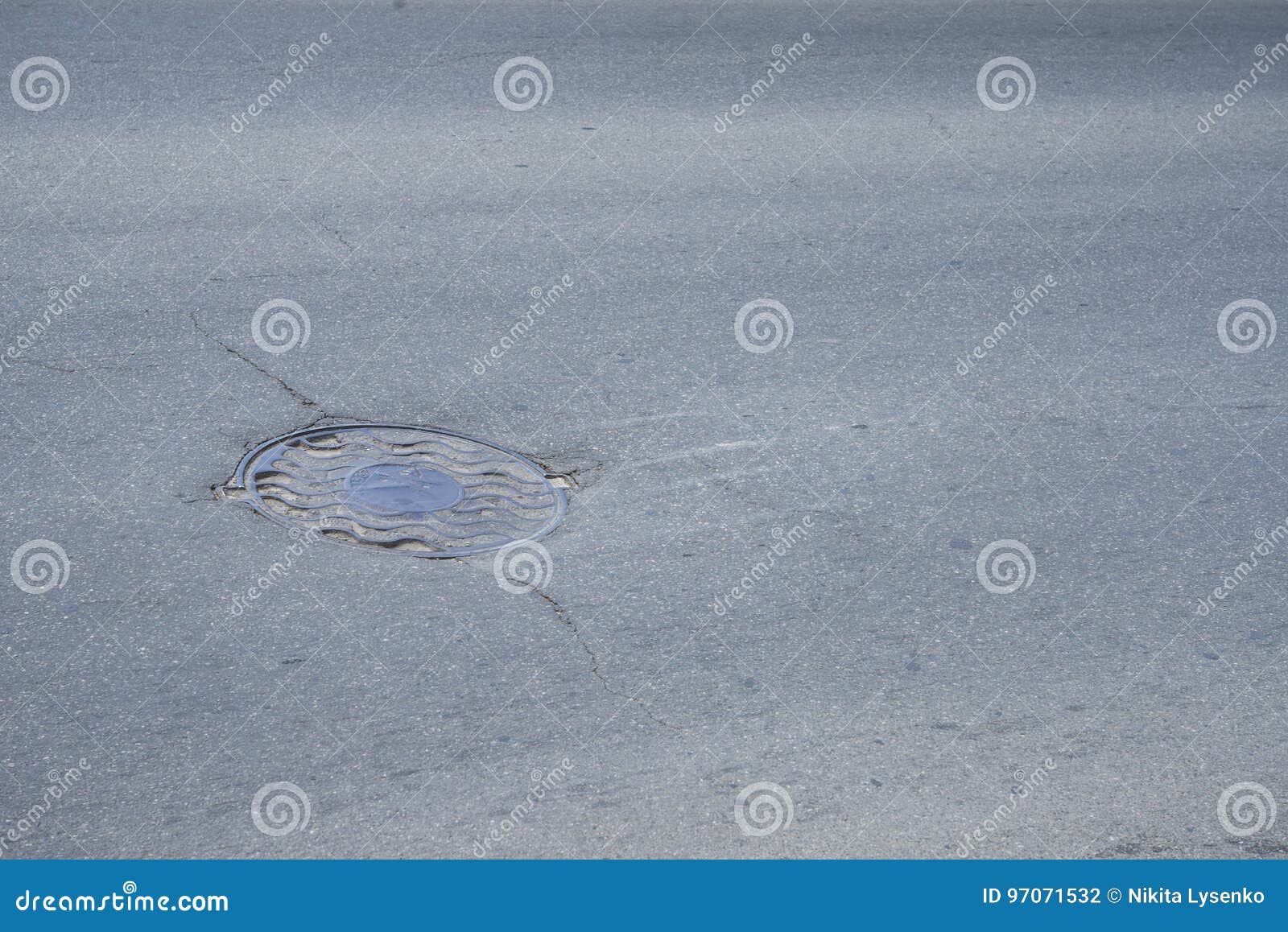 Road with a hatch stock photo. Image of hole, metal, green - 97071532