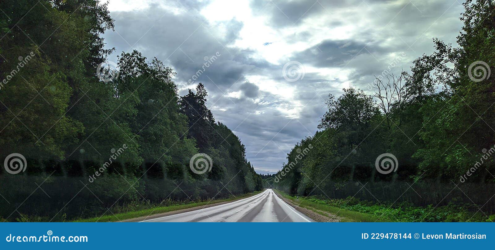 Road with Horizon on Blue Sky and White Clouds View from the Car. Stock ...