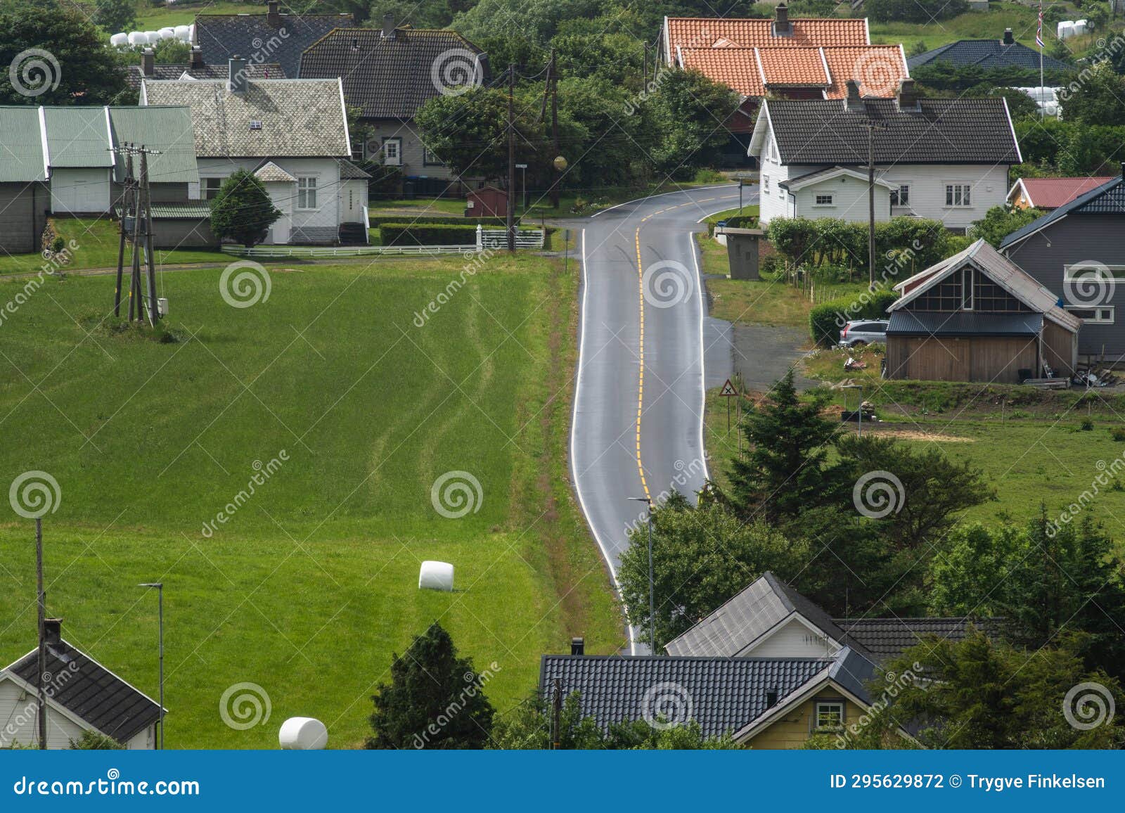 Road between Houses and Green Fields.. Editorial Photography - Image of ...