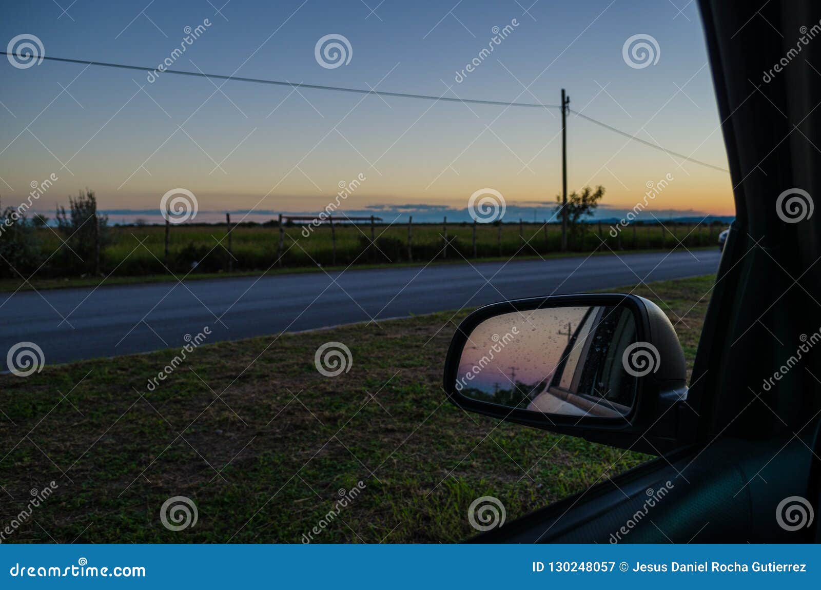 Road from the Inside of a Car and the Reflection of the Rear-view ...